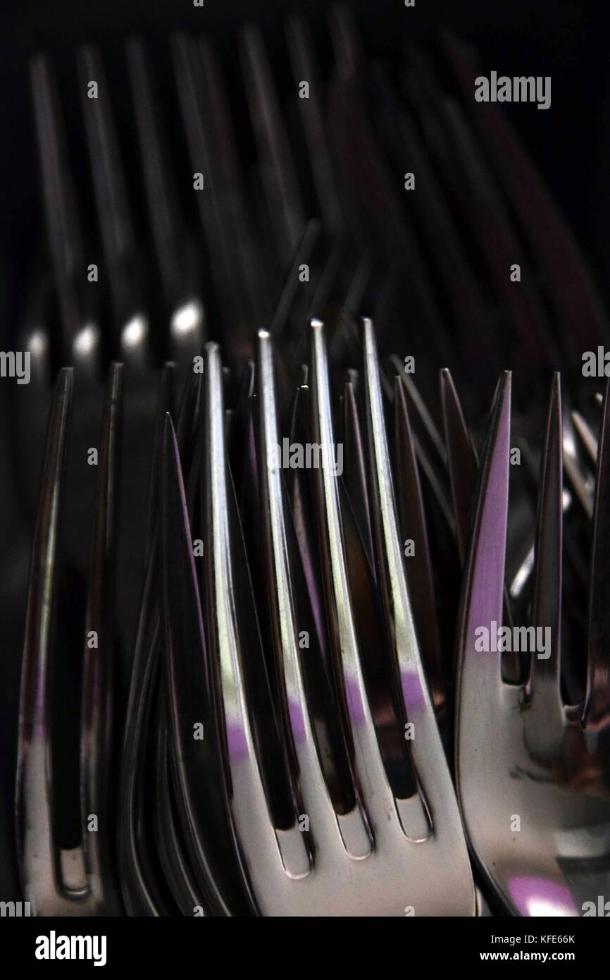 Silver spoons stacked hi-res stock photography and images - Alamy