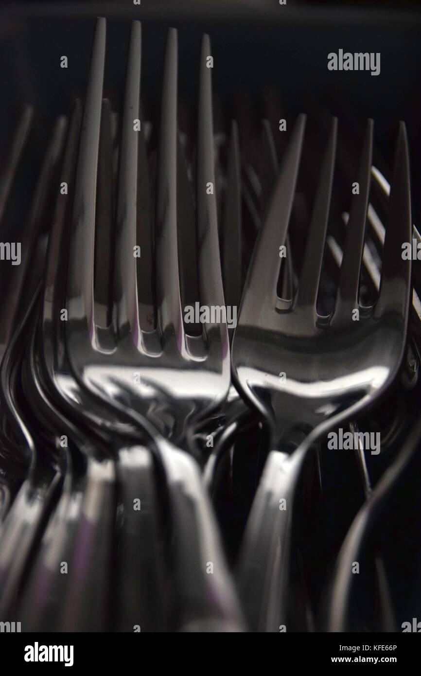 forks in black and white, abstract stacked forks in a cutlery rack ...