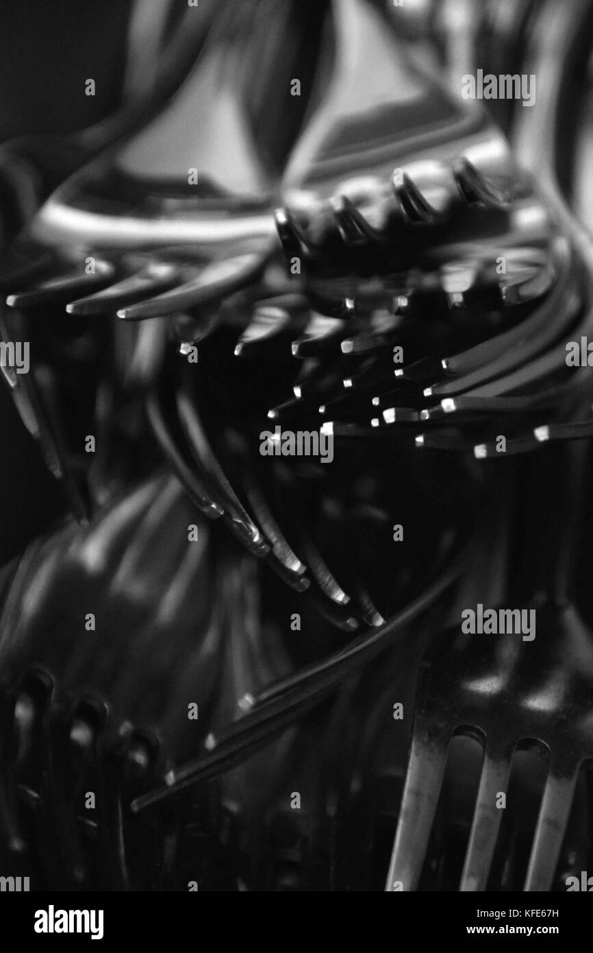 forks in black and white, abstract stacked forks in a cutlery rack ...