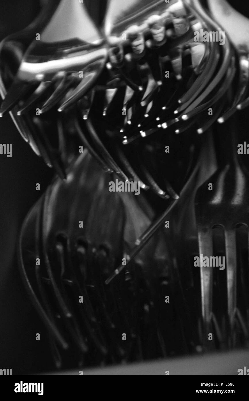 Metal cutlery spoons forks Black and White Stock Photos & Images - Alamy
