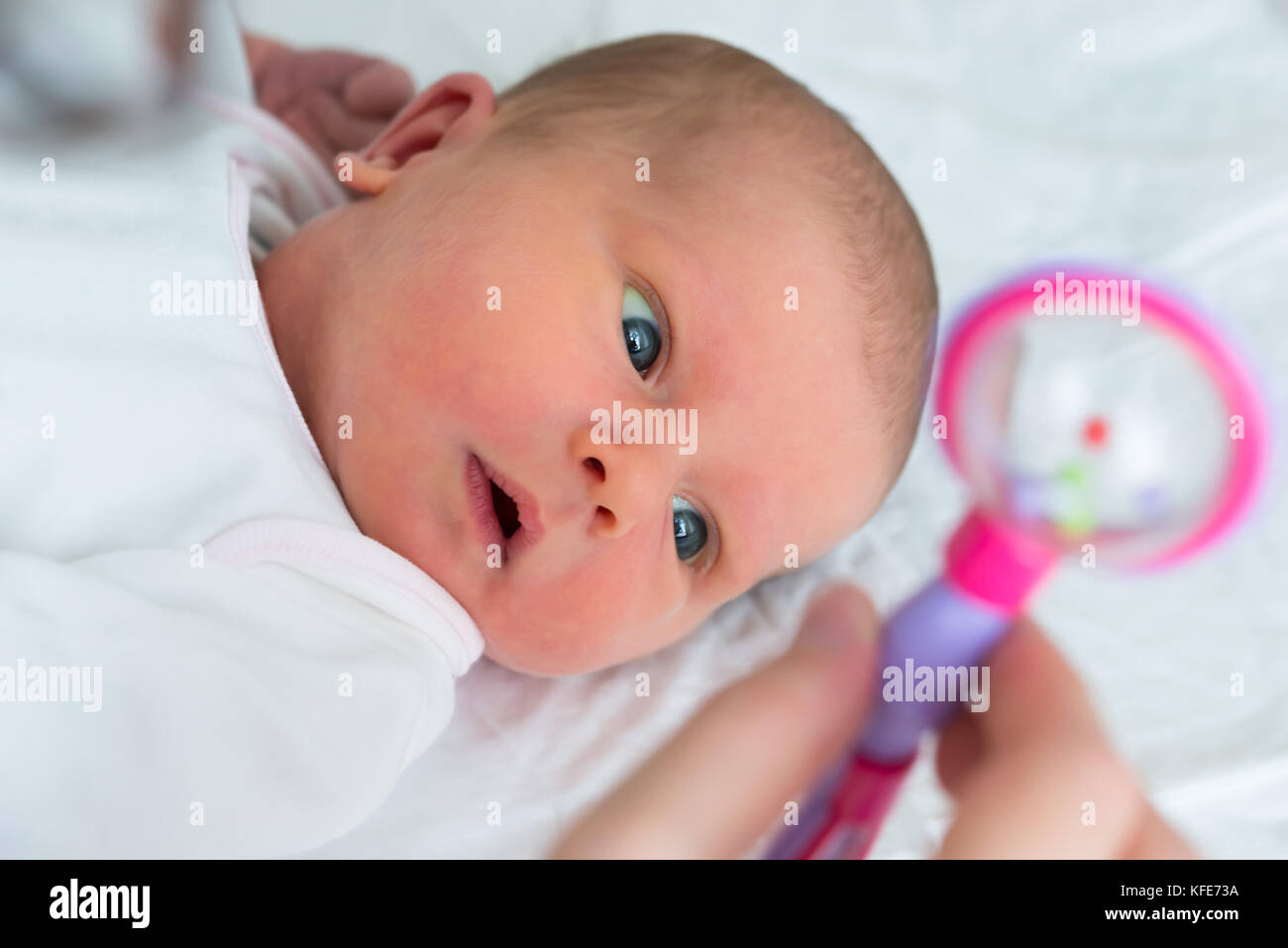 Holding rattle hi-res stock photography and images - Alamy