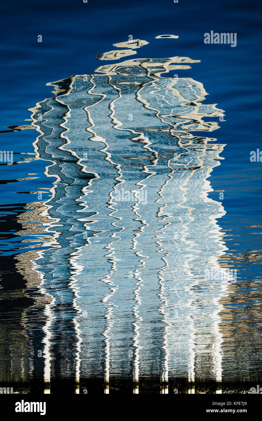 The reversed reflection on water creates an abstract image of the Purdy ...