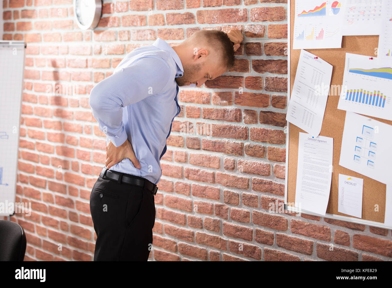 Leaning against wall sitting hi-res stock photography and images - Alamy