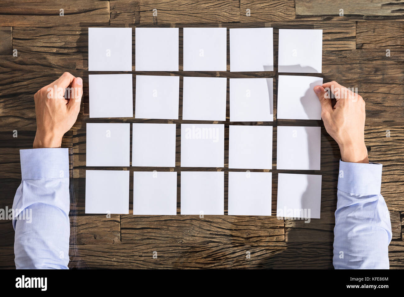 Businessman holding paper note hi-res stock photography and images - Alamy