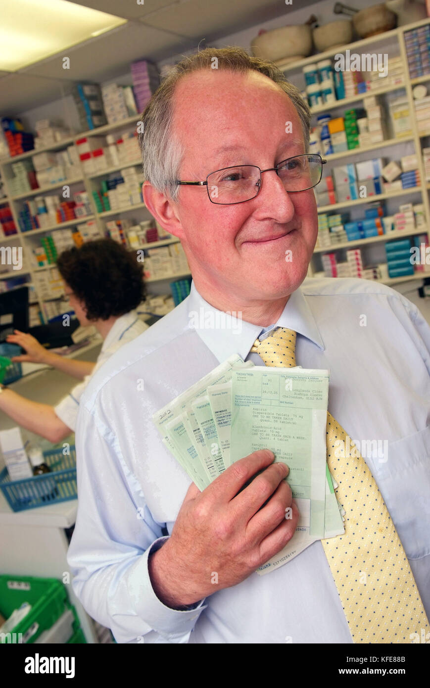 Pharmacy dispenser Chris Badham Stock Photo - Alamy