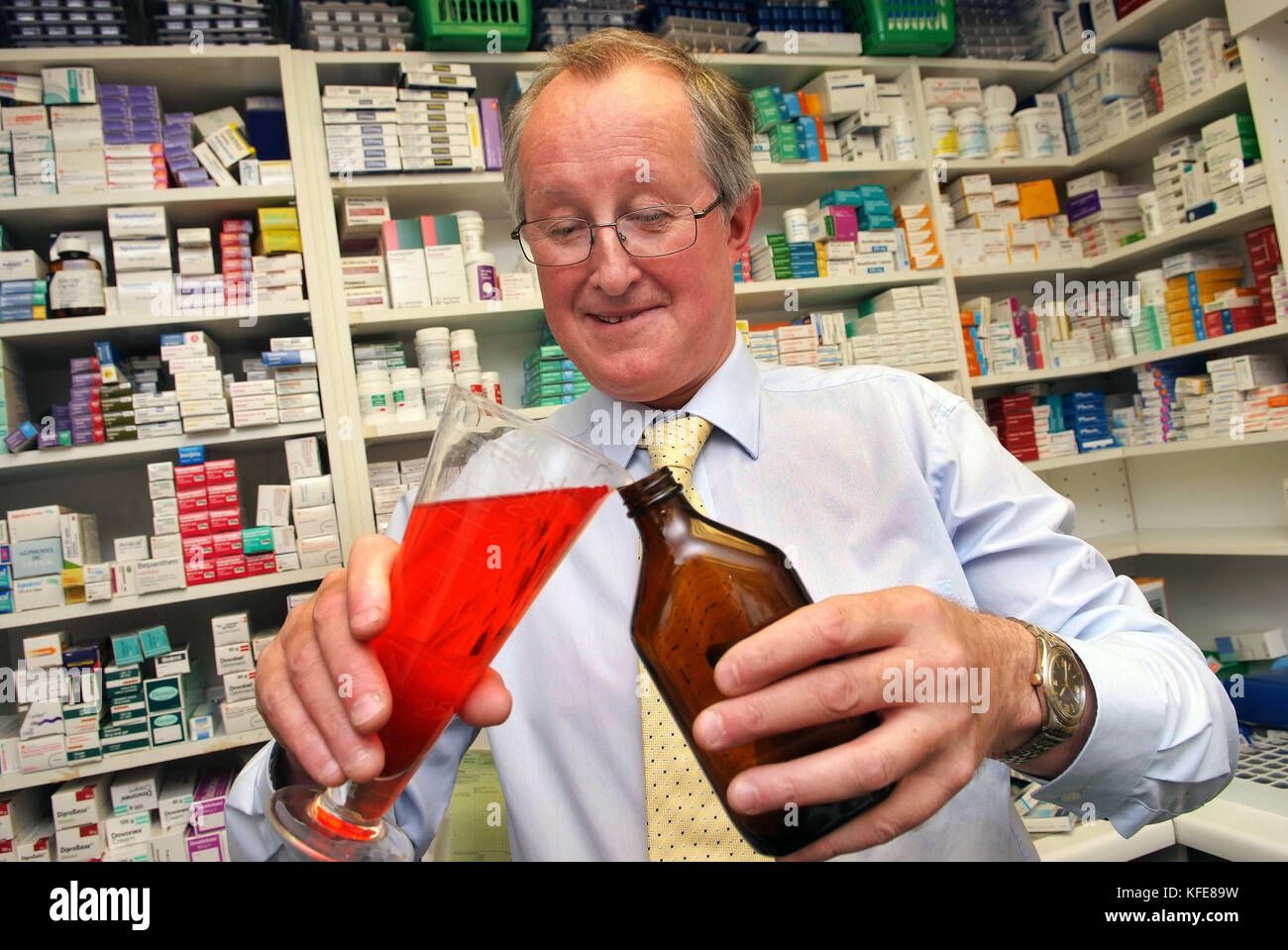 Pharmacy dispenser Chris Badham Stock Photo - Alamy