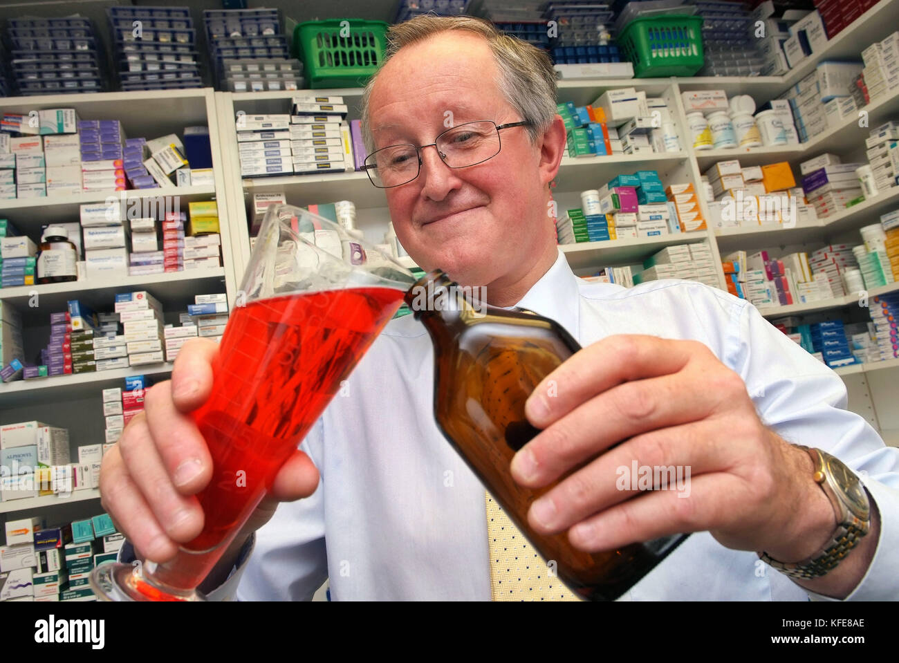 Pharmacy dispenser Chris Badham Stock Photo - Alamy