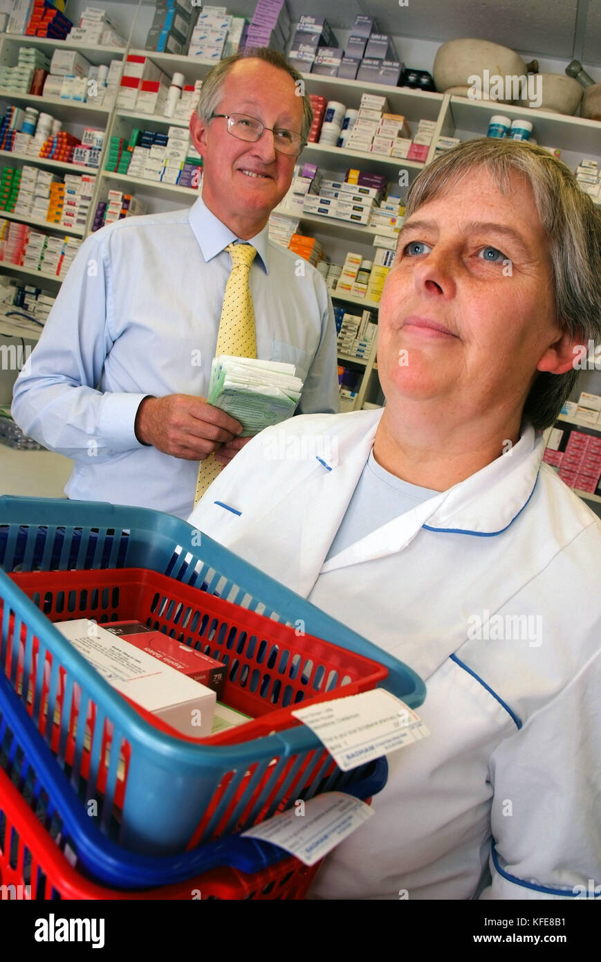 Pharmacy dispenser Chris Badham Stock Photo - Alamy