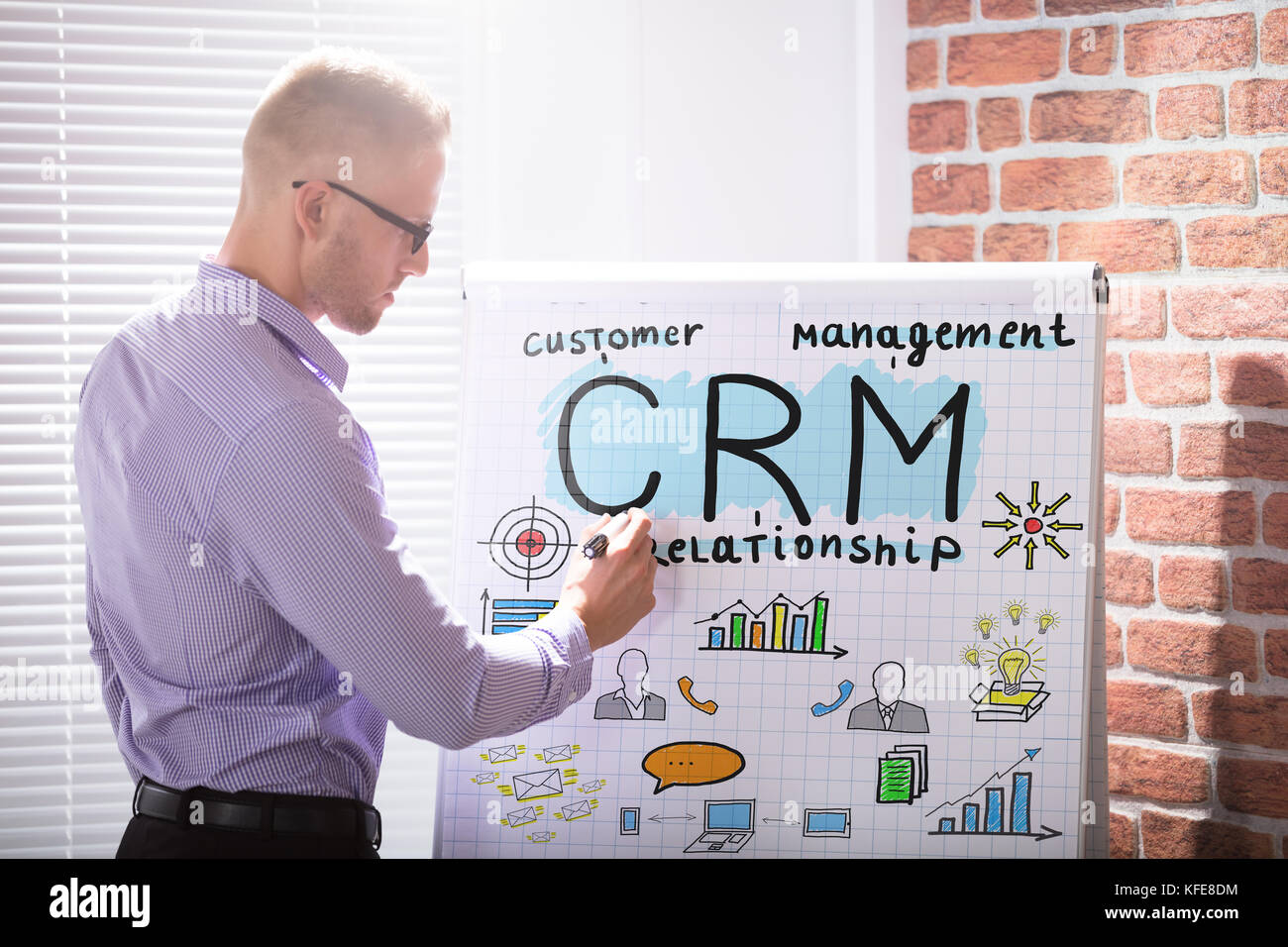 Young Professional Businessman Drawing Customer Relationship Concept At ...