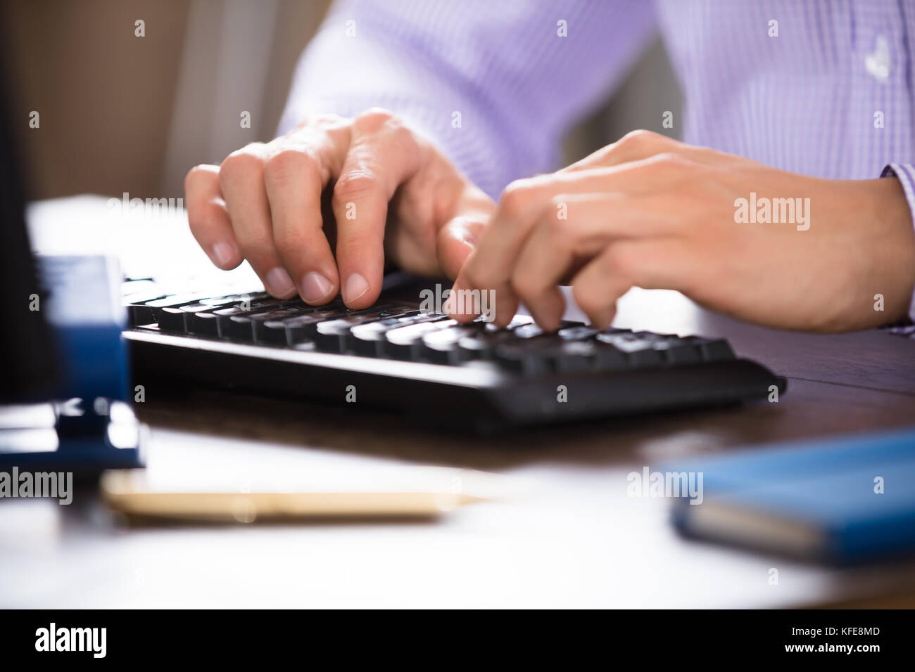 Close-up Of A Businessperson's Hand Typing On Computer Keyboard Stock ...