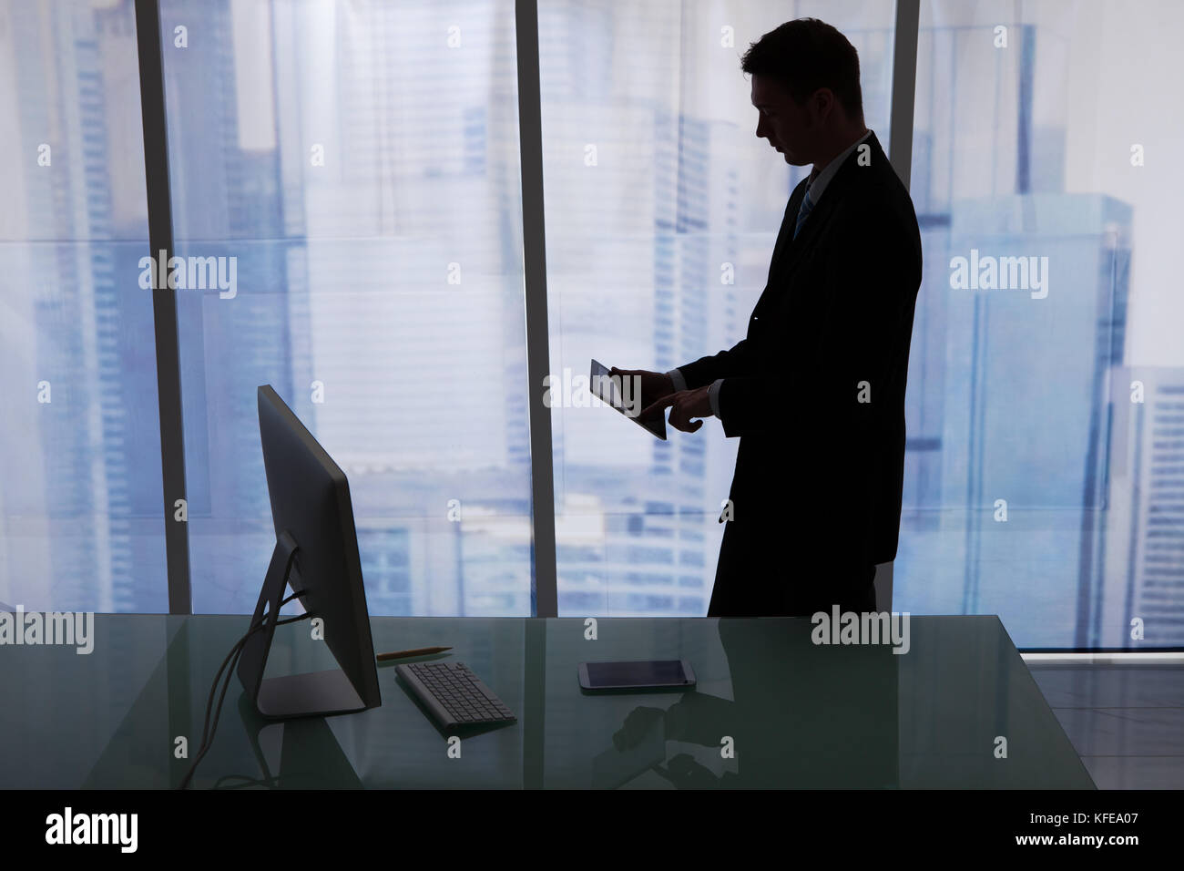 Person using computer silhouette hi-res stock photography and images ...