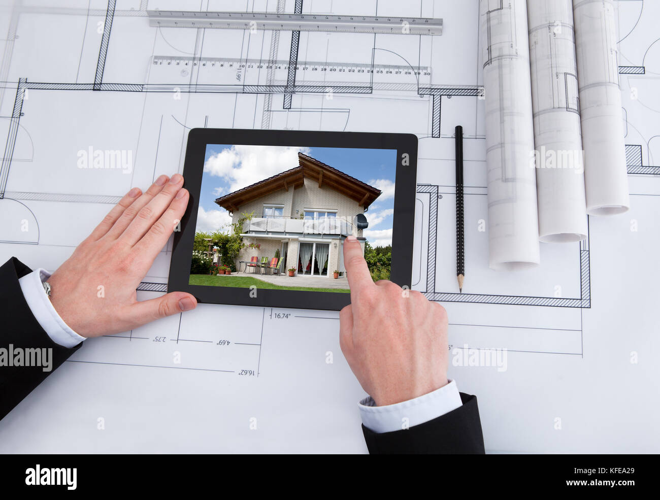 Engineer working building model tablet hi-res stock photography and ...