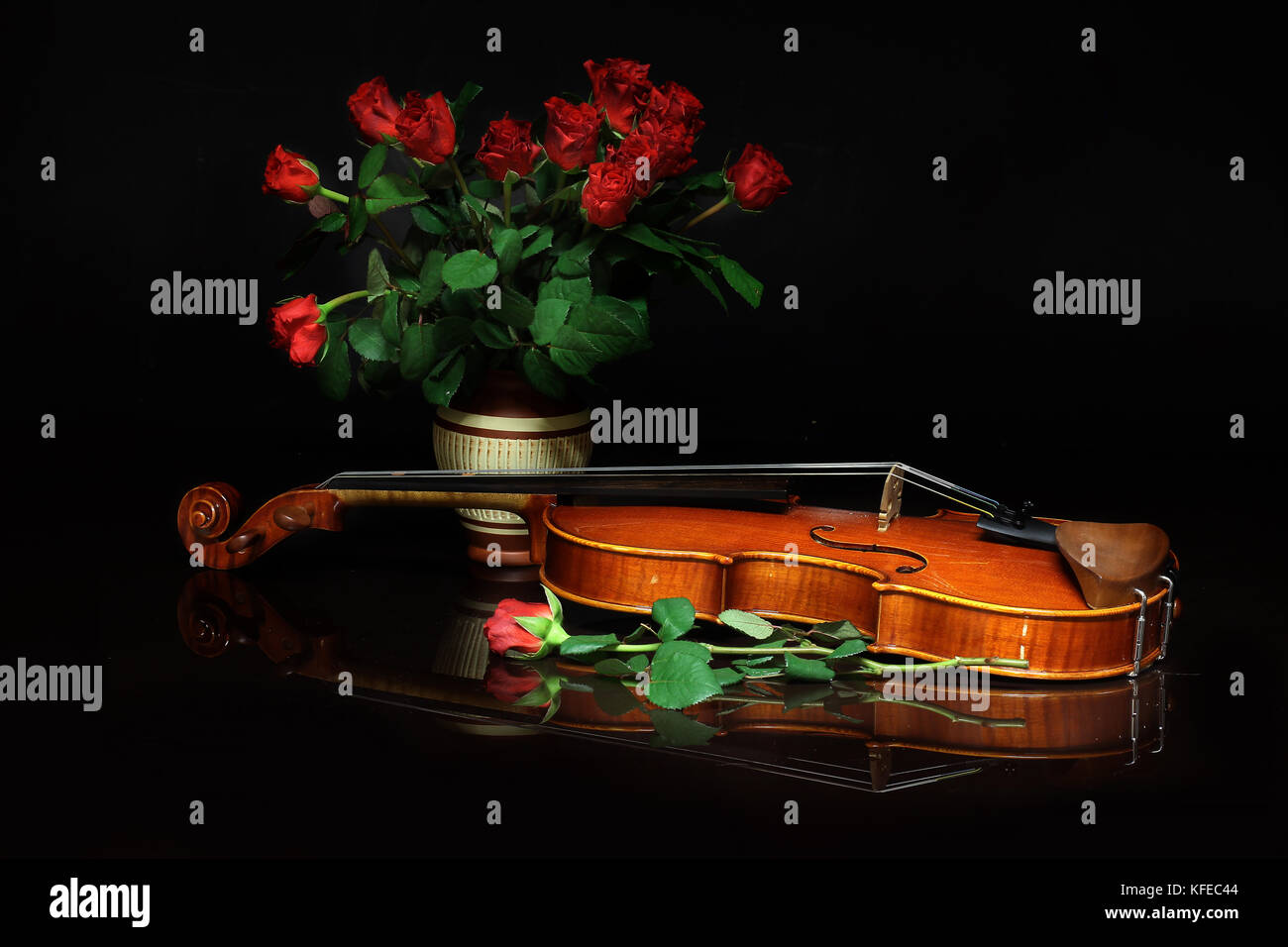 Musical instruments / Violin on a black background Stock Photo - Alamy