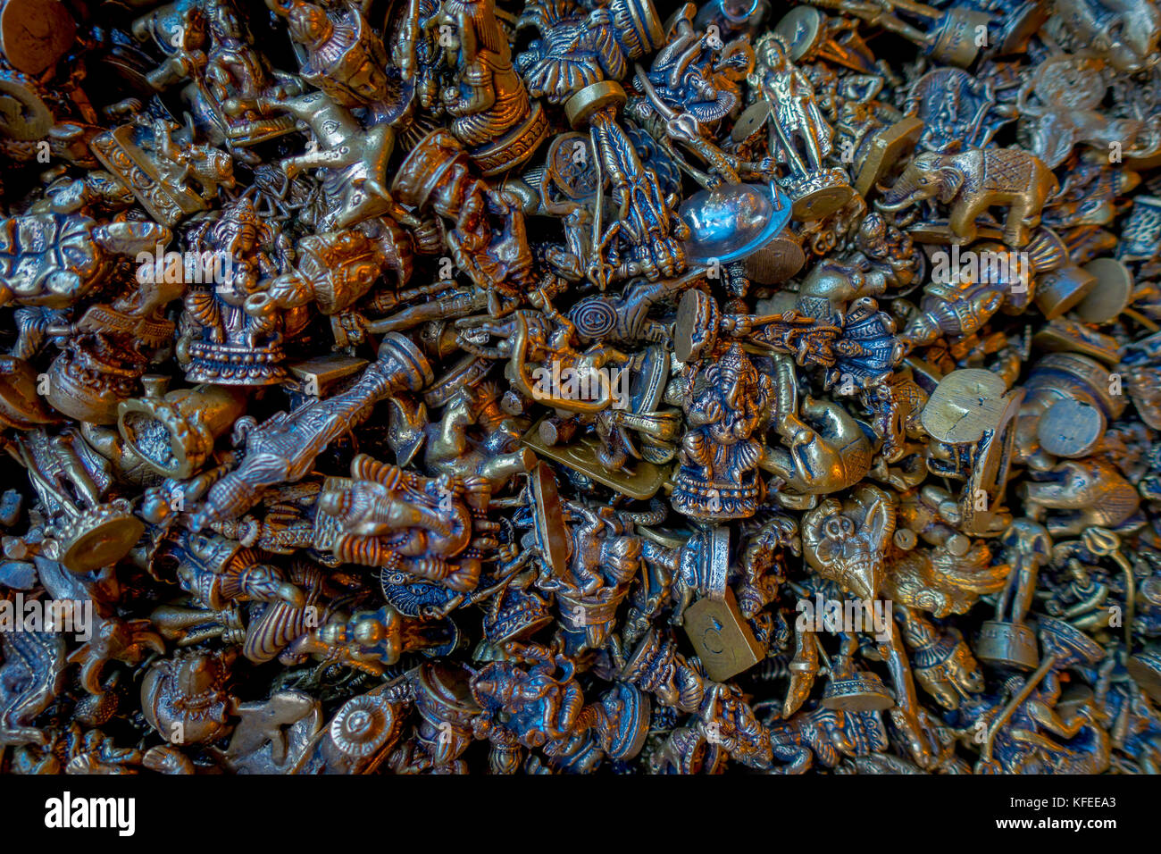 Close up of small bronze crafts of different figures for get luck in ...