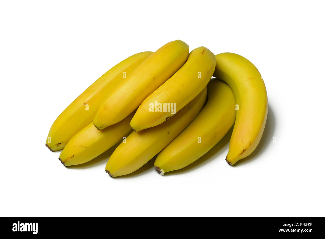 Pile of bananas on white background - closeup Stock Photo - Alamy