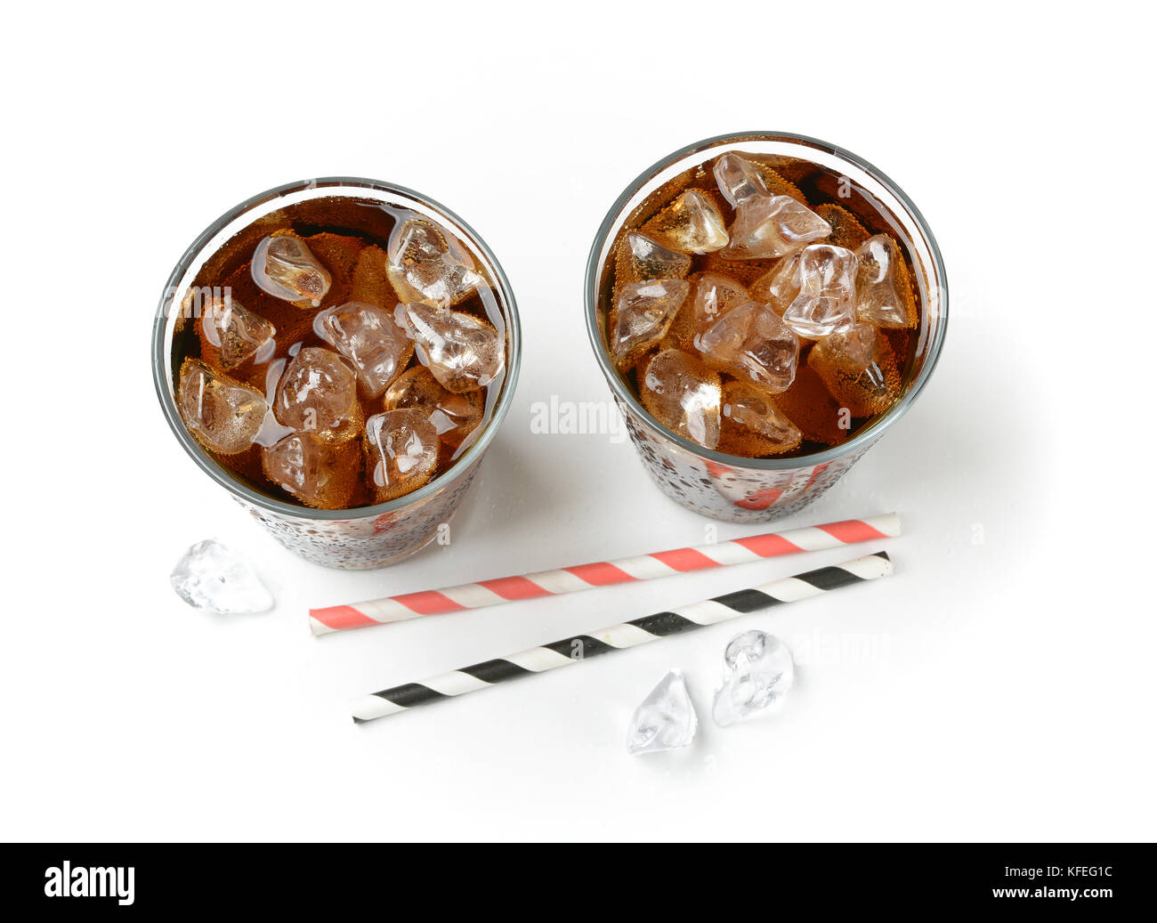 Cola with crushed ice in the glass on white background - closeup Stock ...