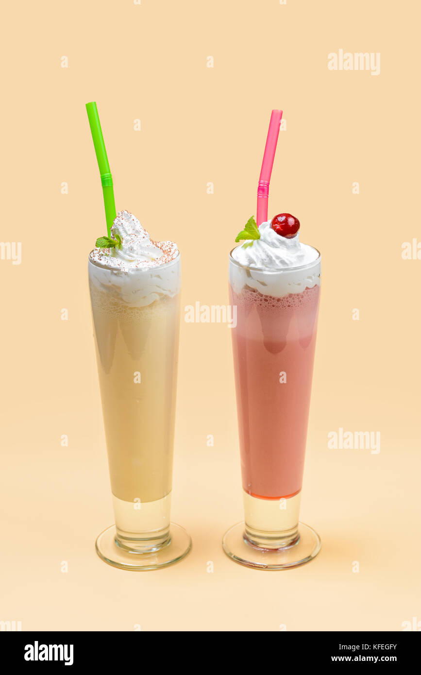 Fruit Milkshake in high glass with tube Stock Photo - Alamy