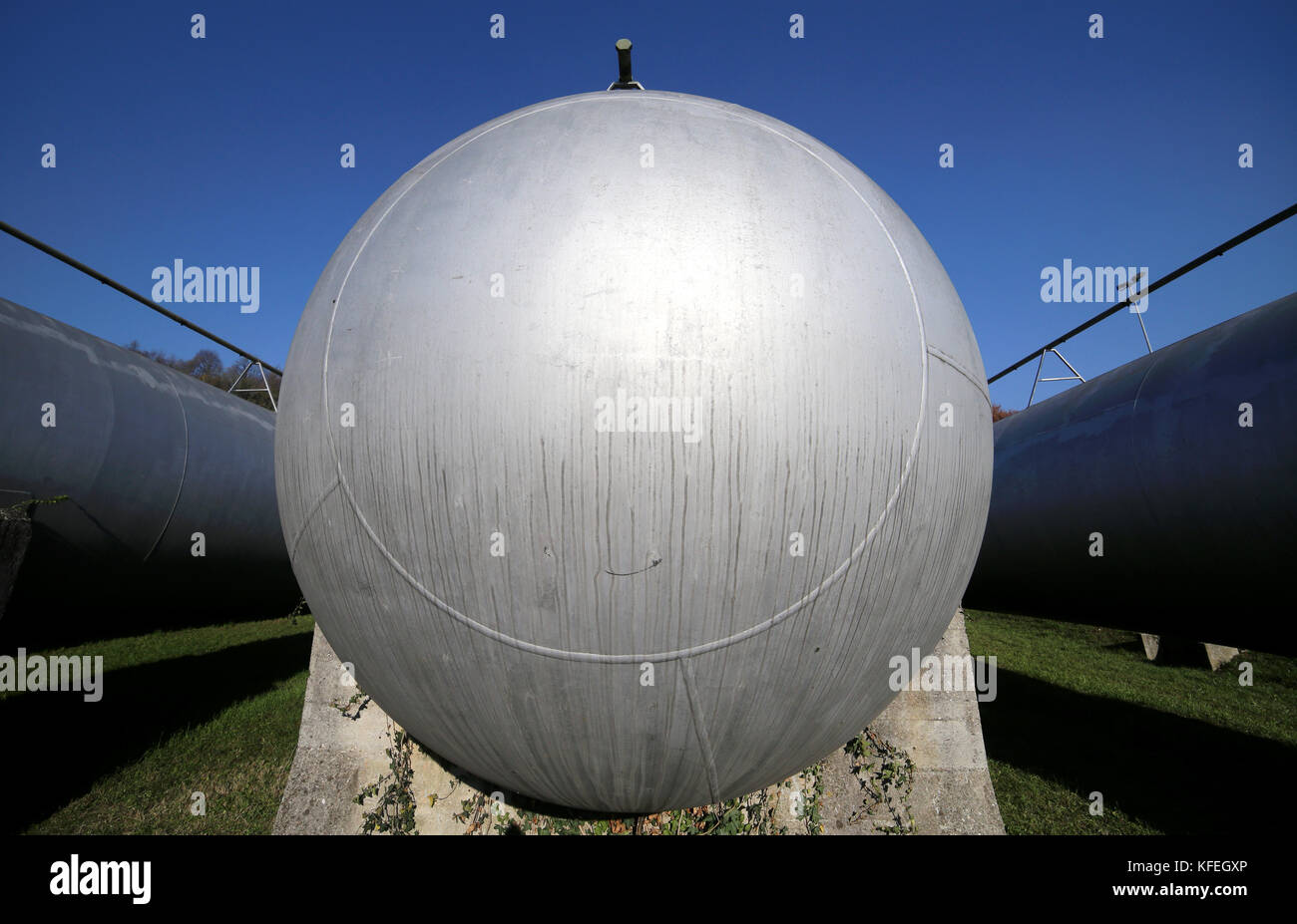Big gas storage tanks in an industrial area. Large cylinders are used ...