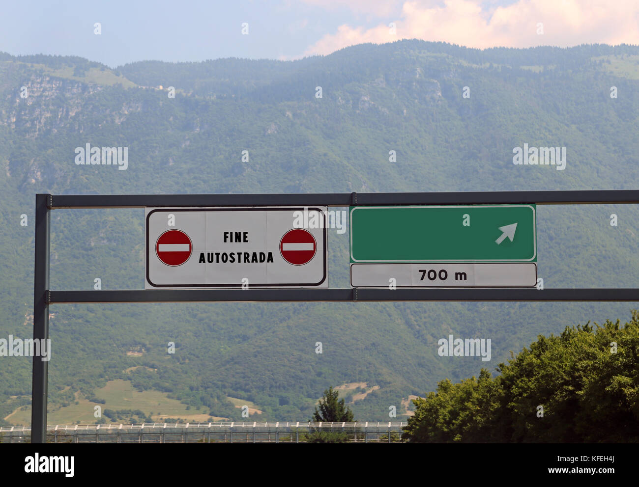 traffic sign at end of highway in italy and the text Fine Autostrada ...