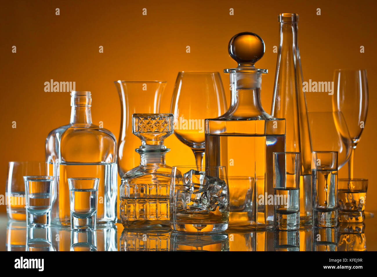 Alcoholic drinks in bar on glass table Stock Photo - Alamy