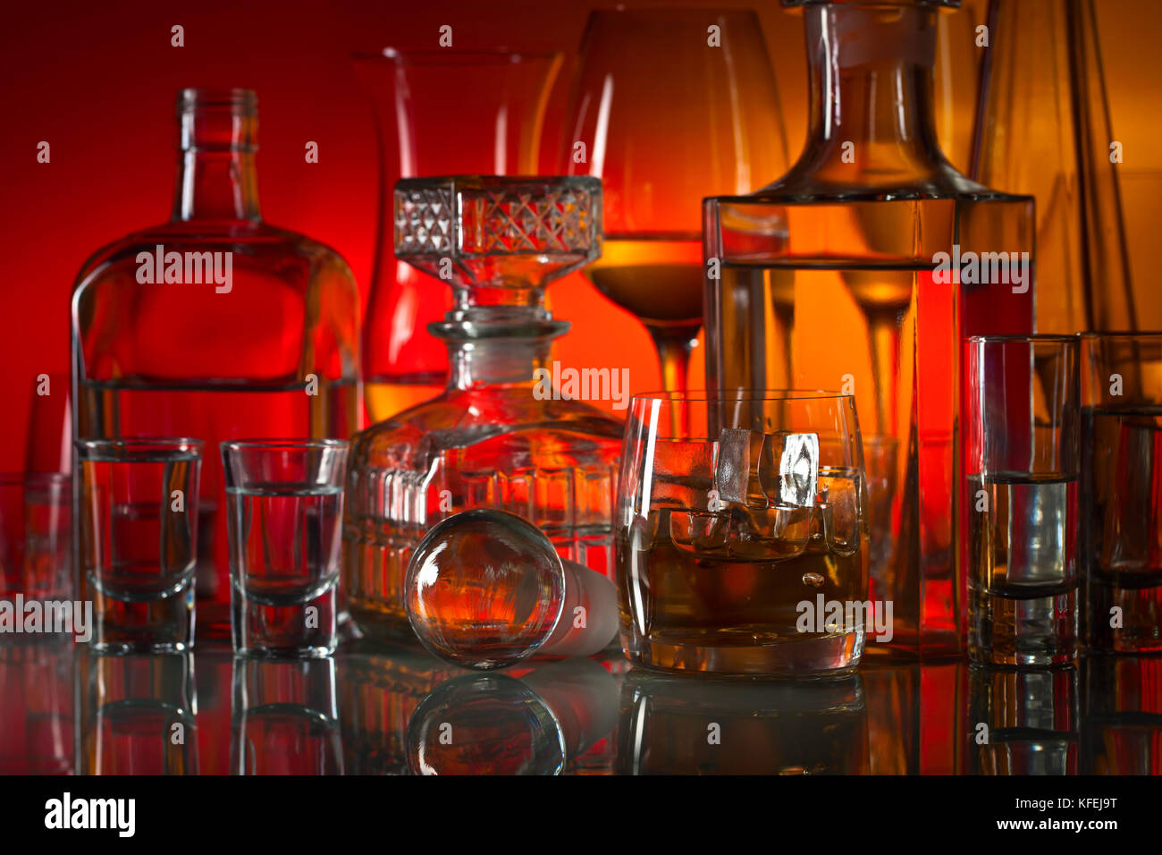 Alcoholic drinks in bar on glass table Stock Photo - Alamy