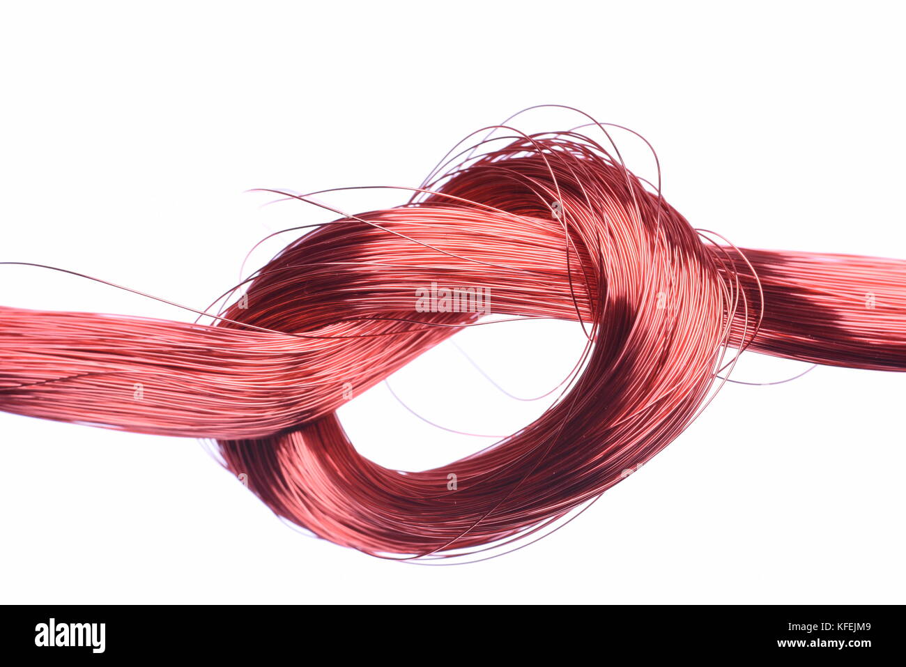 Loop on the copper wire isolated on white background Stock Photo - Alamy