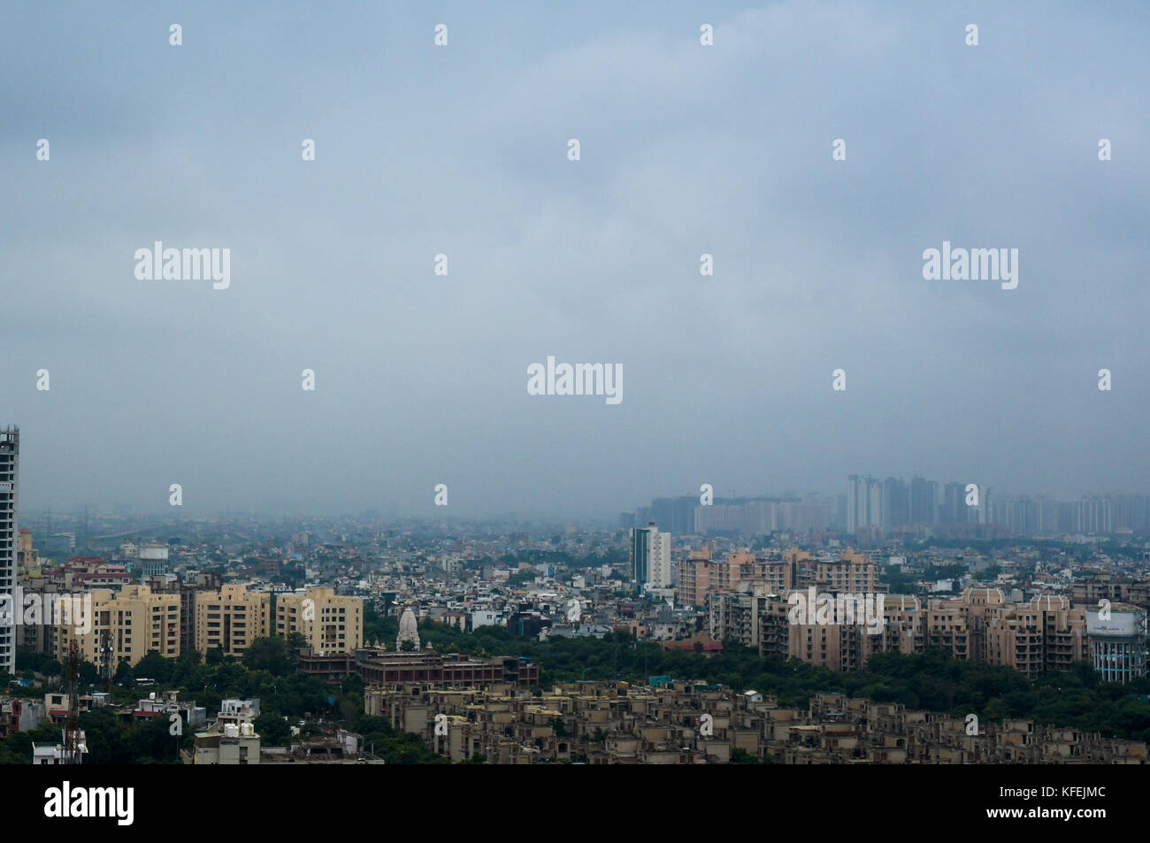 Noida Skyscraper under construction with smaller buildings aroun Stock ...