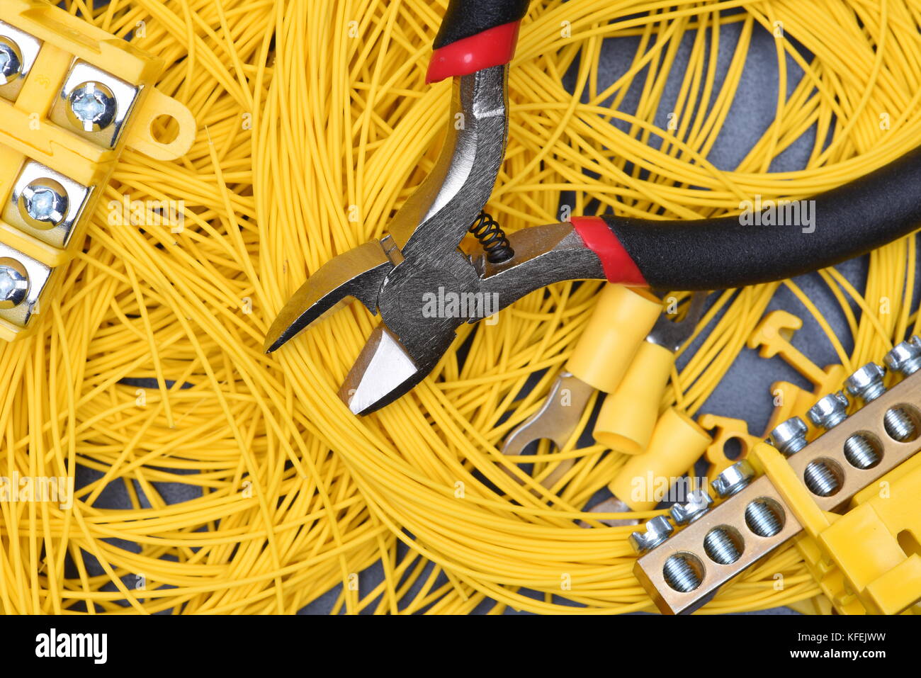 Cables, electrical equipment and tools on metal table , directly above ...
