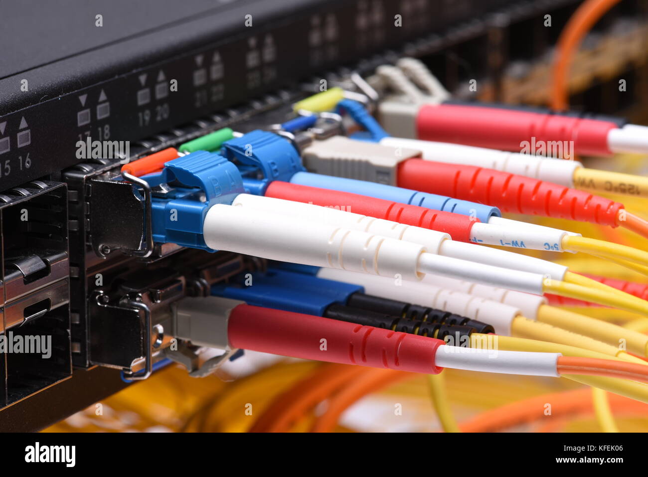 Fiber Optic cables connected to switch in data center Stock Photo - Alamy