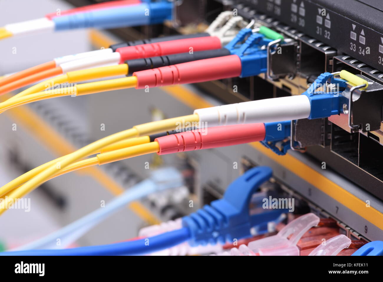 Fiber optic and network patch cord cables in data center Stock Photo ...