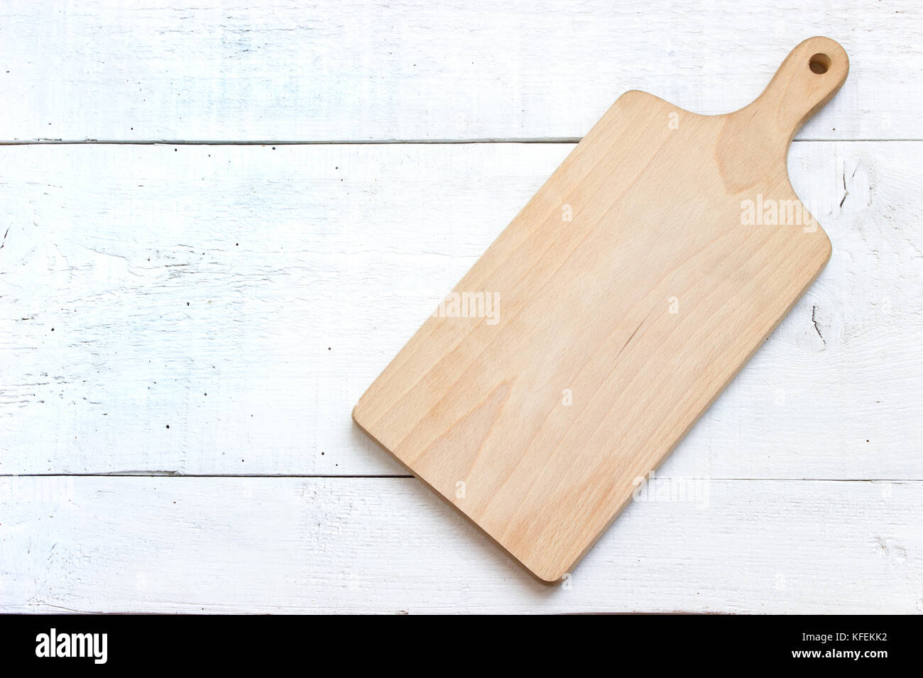 Wooden chopping board on white background Stock Photo - Alamy