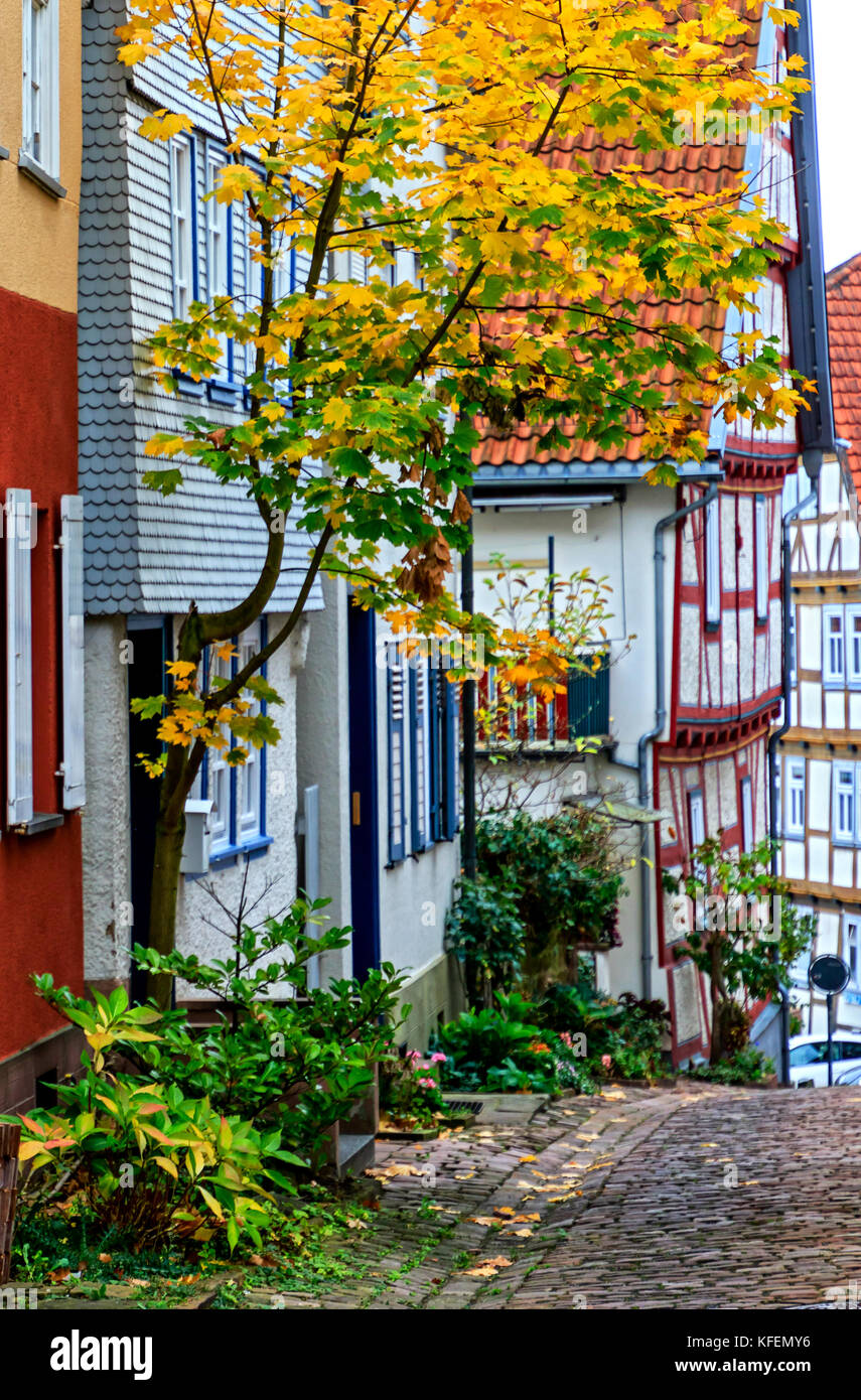 A cobbled steep alley in Old Town of Romantic Burgenstadt Schlitz ...