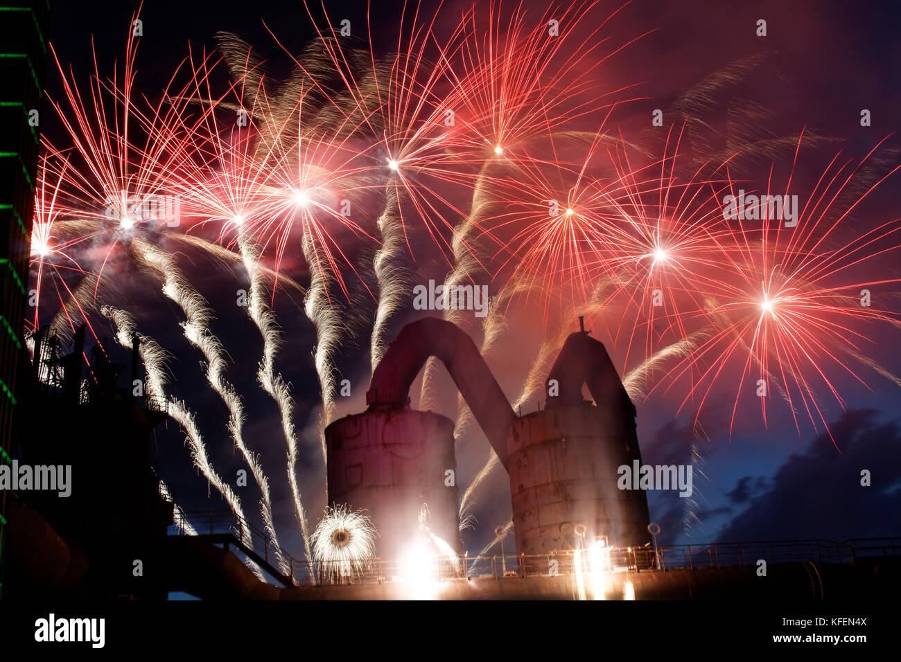 fireworks behind a blast furnace and stell mill Stock Photo - Alamy