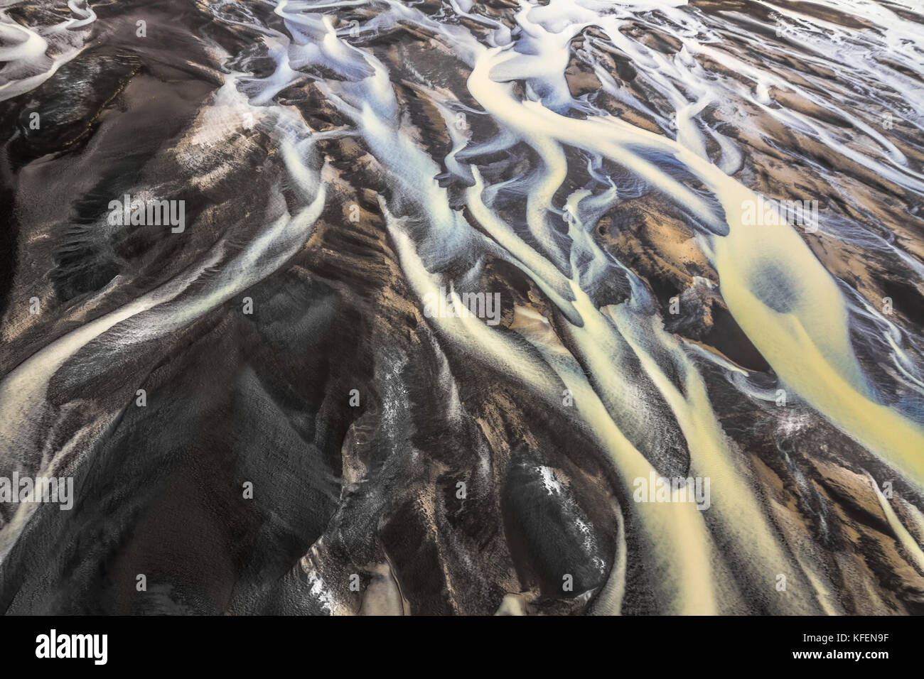 River Shapes in the Black Sand Stock Photo - Alamy