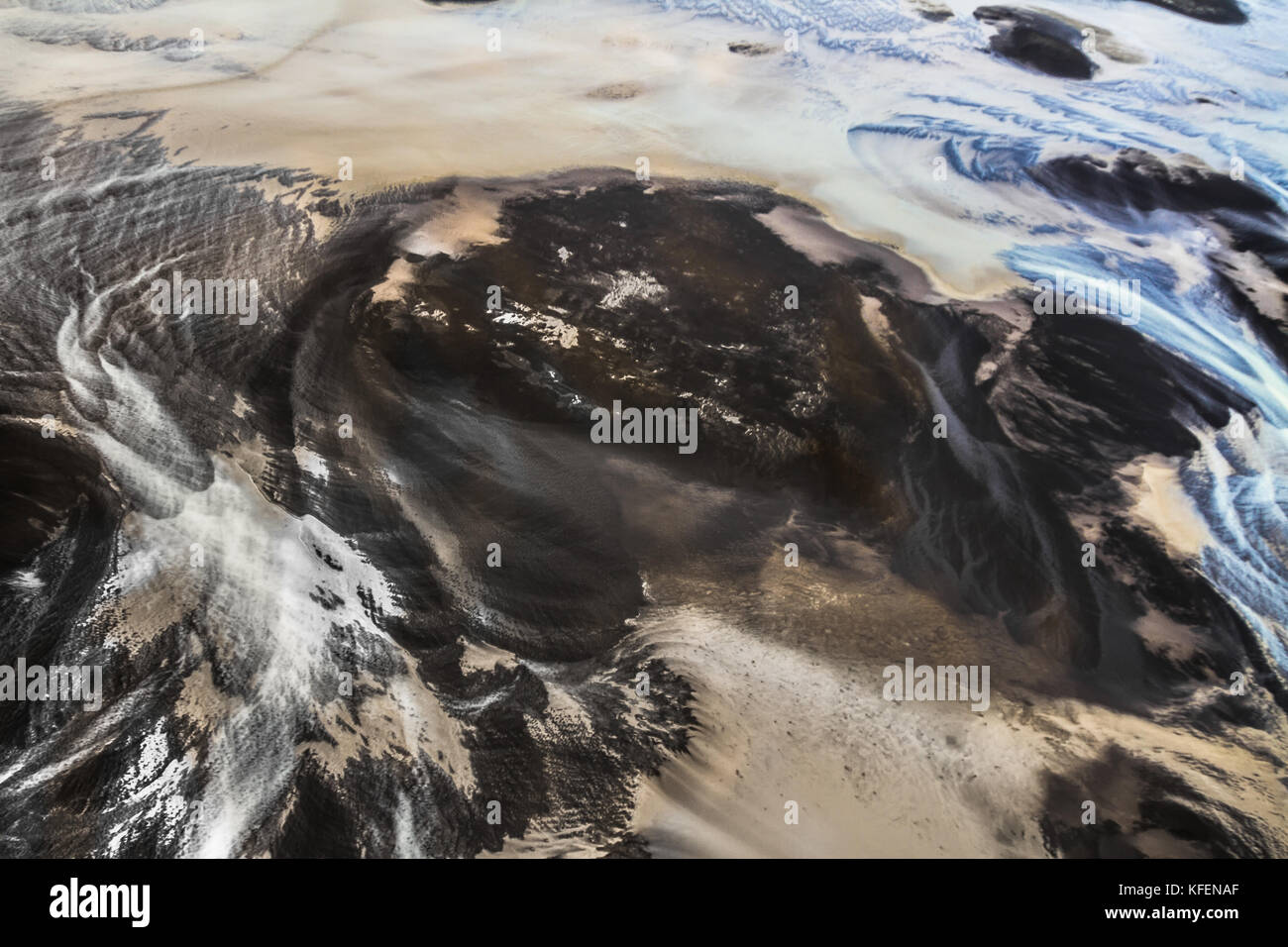 River Shapes in the Black Sand Stock Photo - Alamy