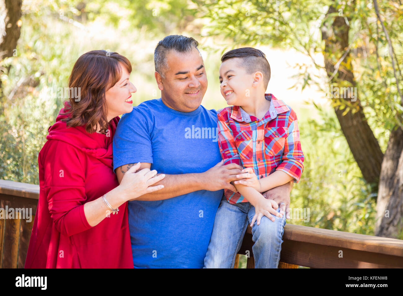 Mixed Race Caucasian and Hispanic Family At The Park Stock Photo - Alamy