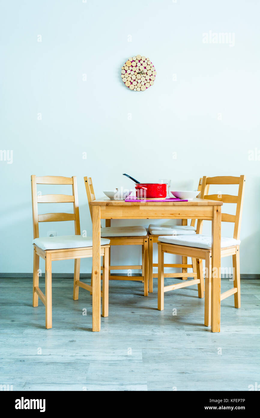 Minimalistic dinning table Stock Photo - Alamy