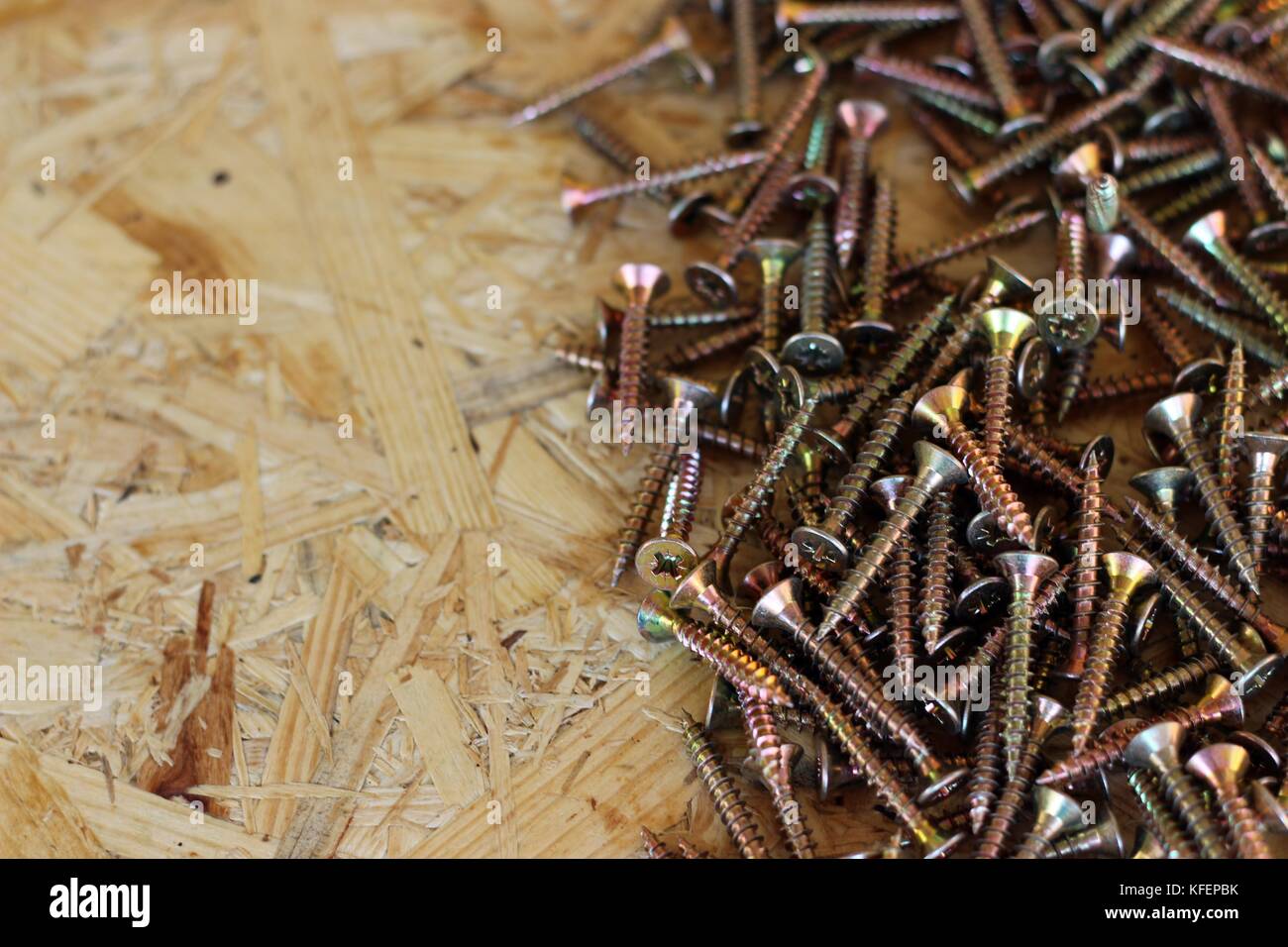 wood screw, brown background, carpenter tool Stock Photo - Alamy