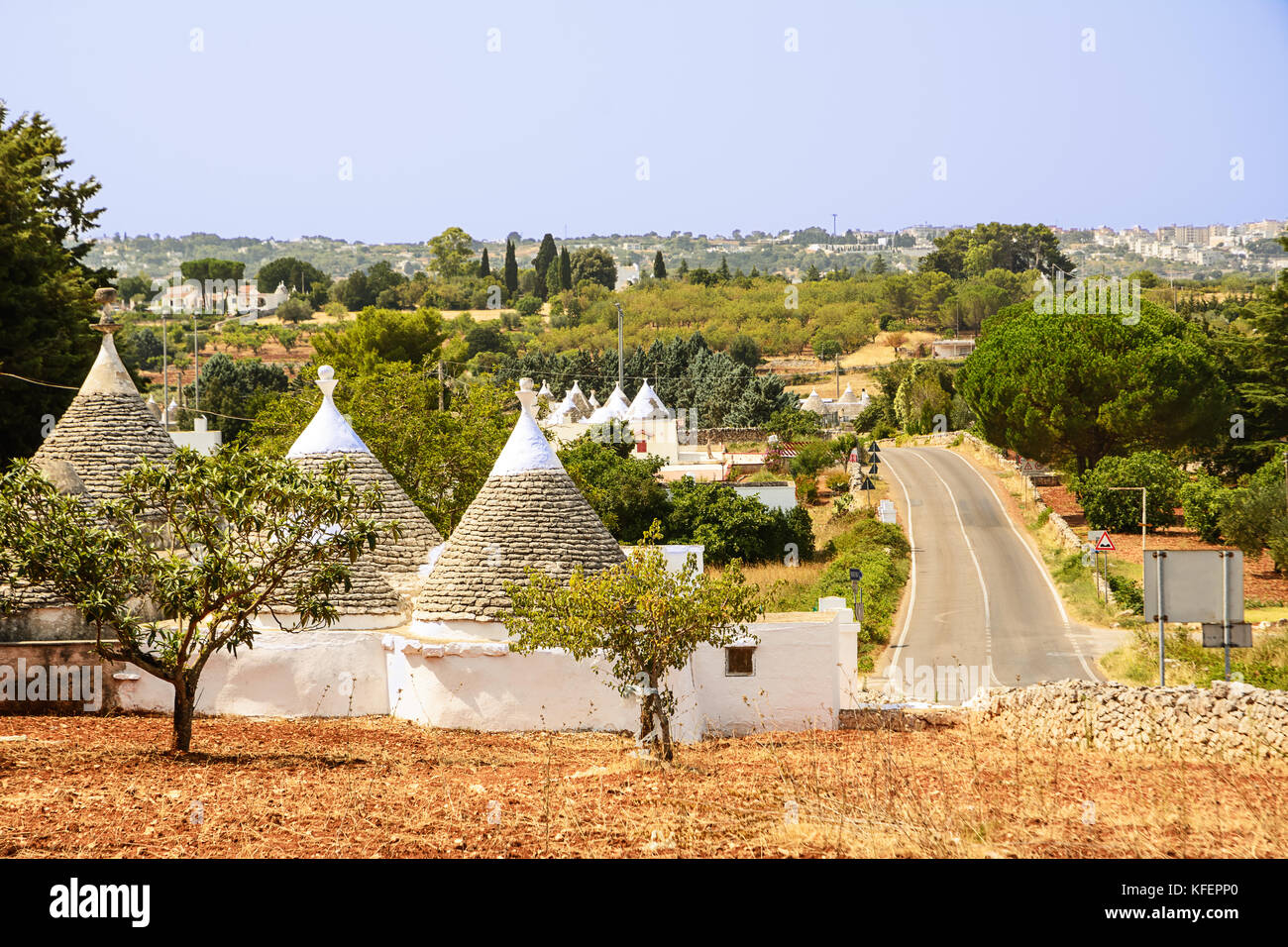 Trulli in the countryside of the Itria valley Stock Photo - Alamy