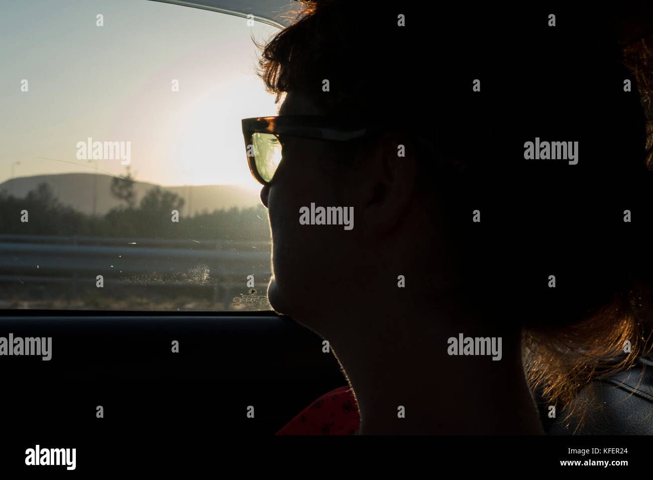 Woman looking out of window hi-res stock photography and images - Alamy