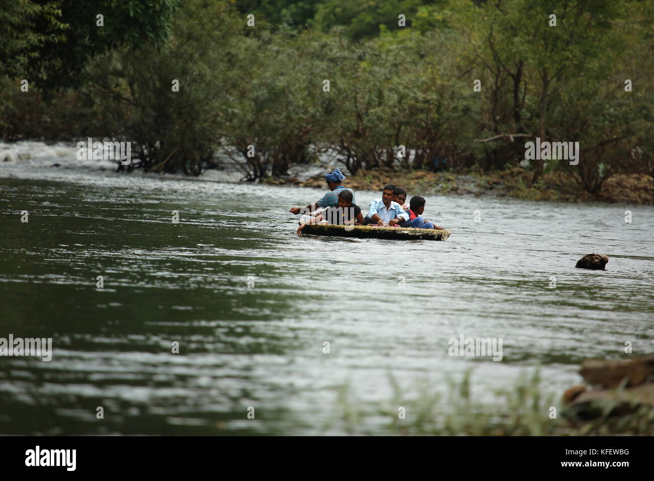 transportation in a Rustic round coracle floating basket boat made of ...