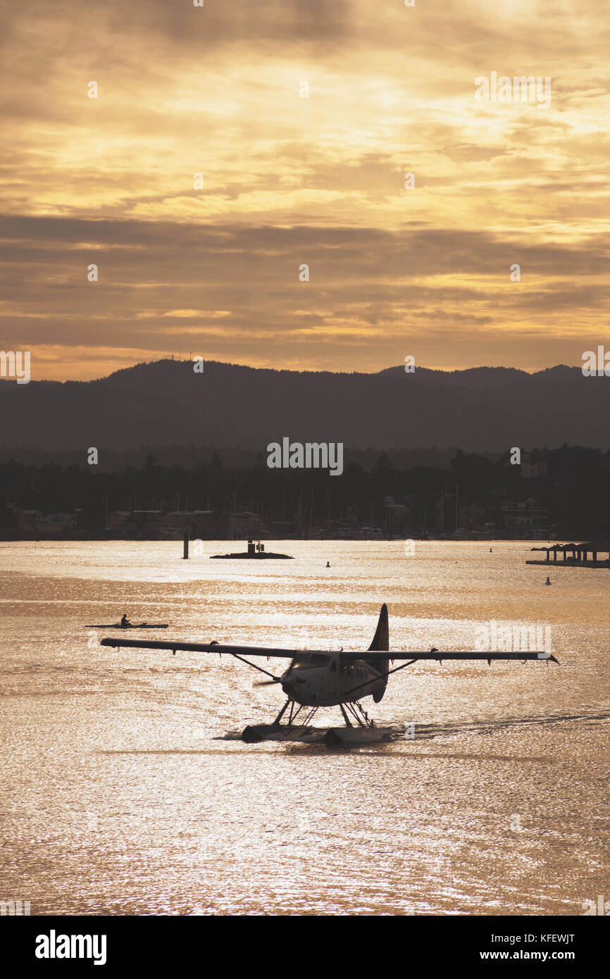 Seaplane on Victoria Harbour at sunset. Victoria BC Canada Stock Photo ...