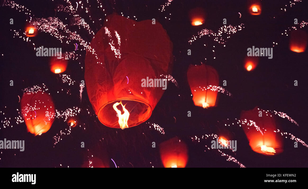 Sky lanterns are flying on night black sky Stock Photo - Alamy