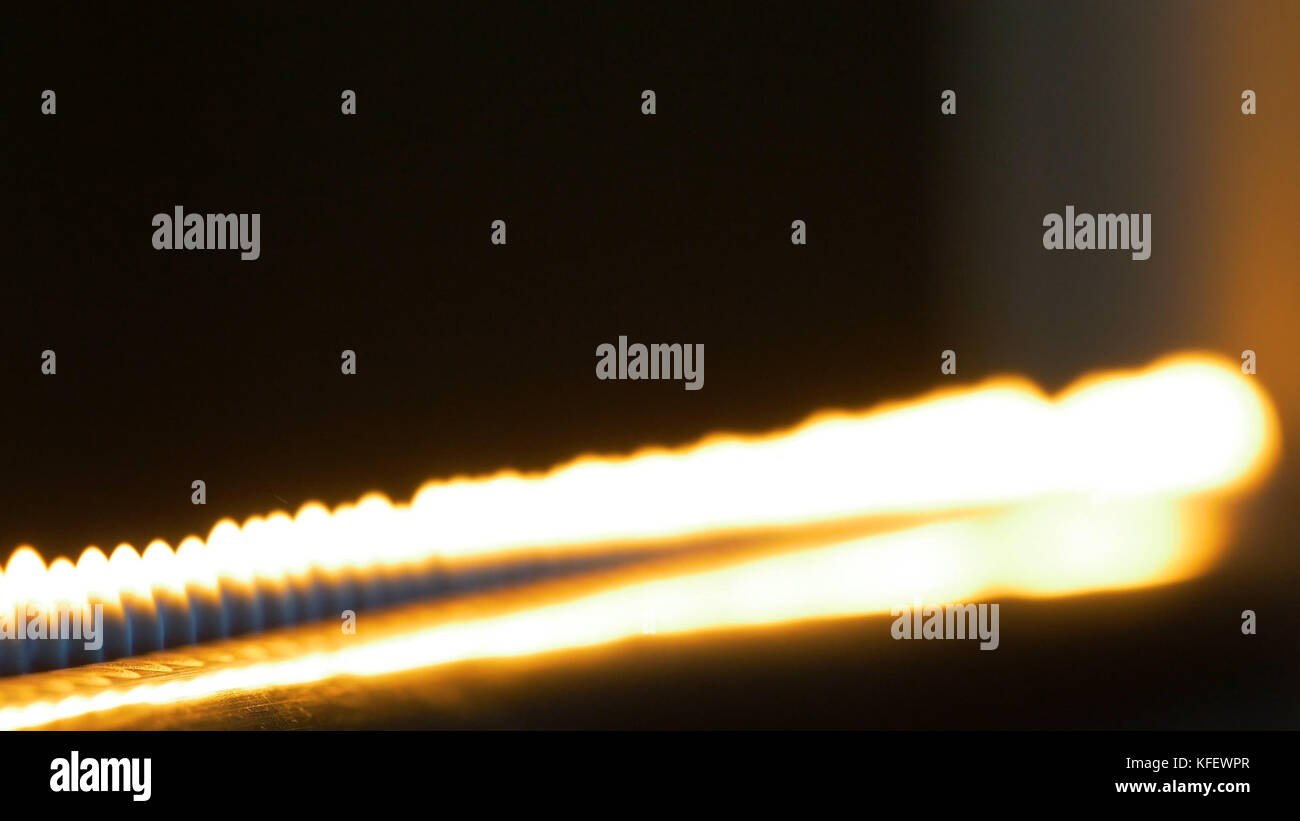 Pipe with fire in the chemistry laboratory close up. Gas system in the ...