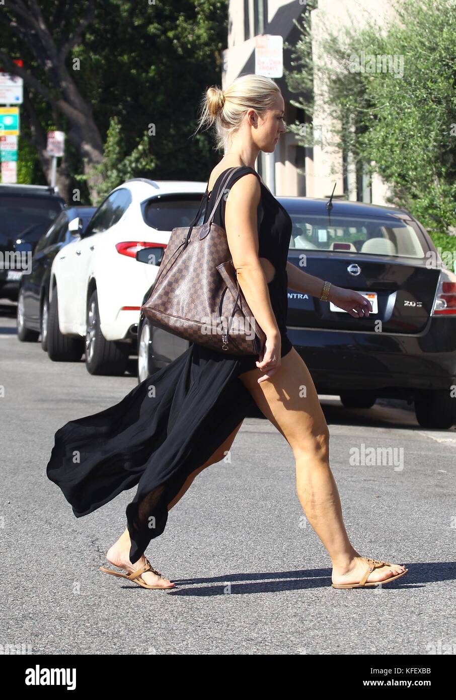 Caroline Pearce shows off her perfect figure whilst out and about in ...