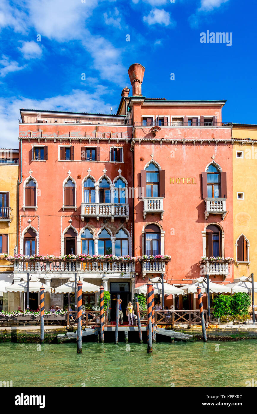 Colourful buildings such as this deep red coloured building along the ...