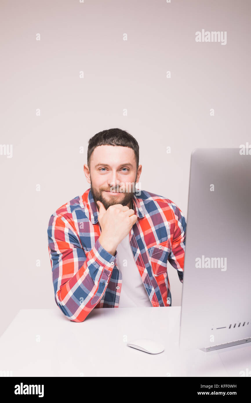 Man working with white computer at office desk Stock Photo - Alamy