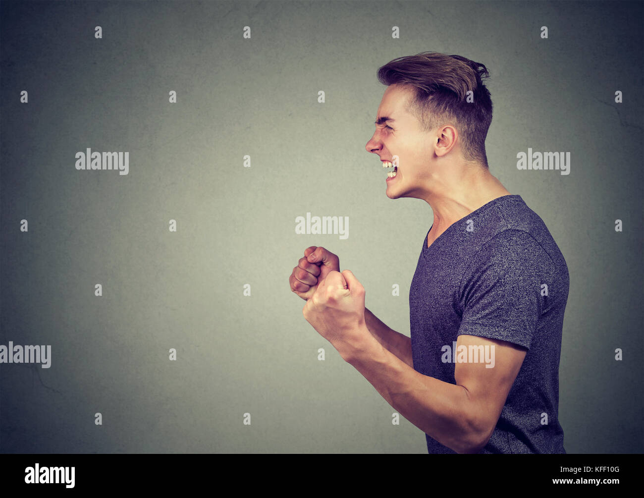 portrait of young angry man screaming Stock Photo - Alamy