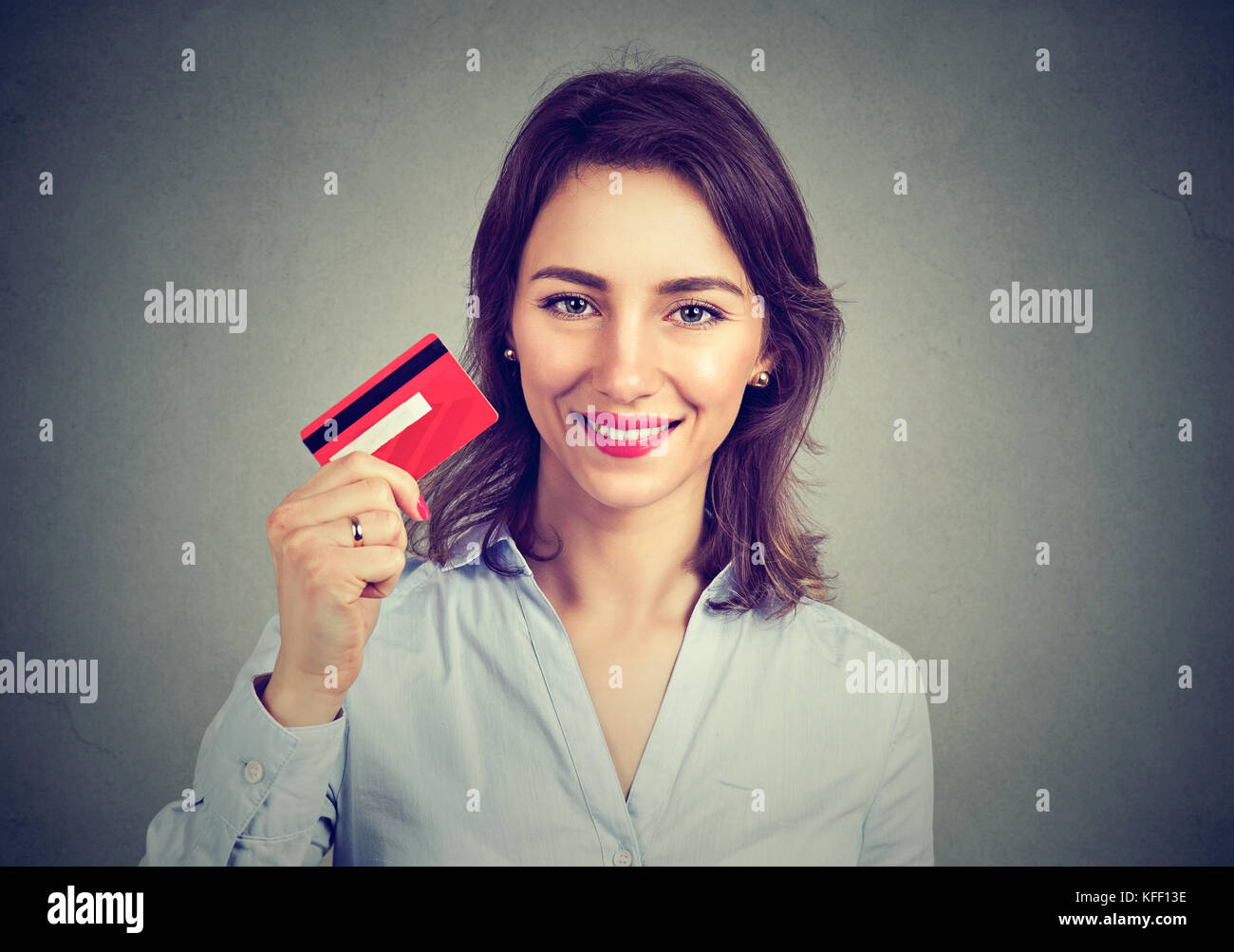 Happy woman holding showing credit card Stock Photo - Alamy Happy woman holding showing credit card Stock Photo - Alamy