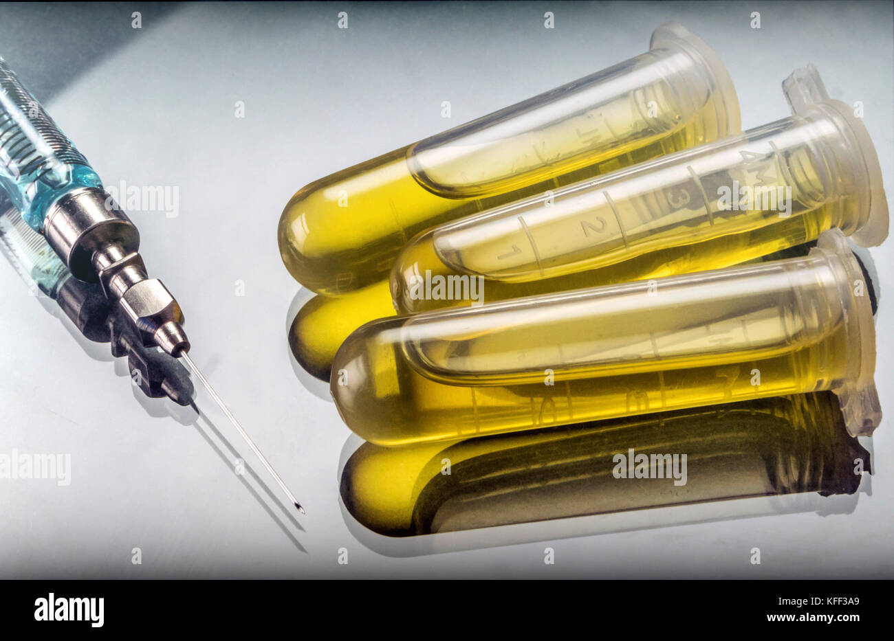 Several Vials And Syringe In Laboratory, Conceptual Image Stock Photo - Alamy